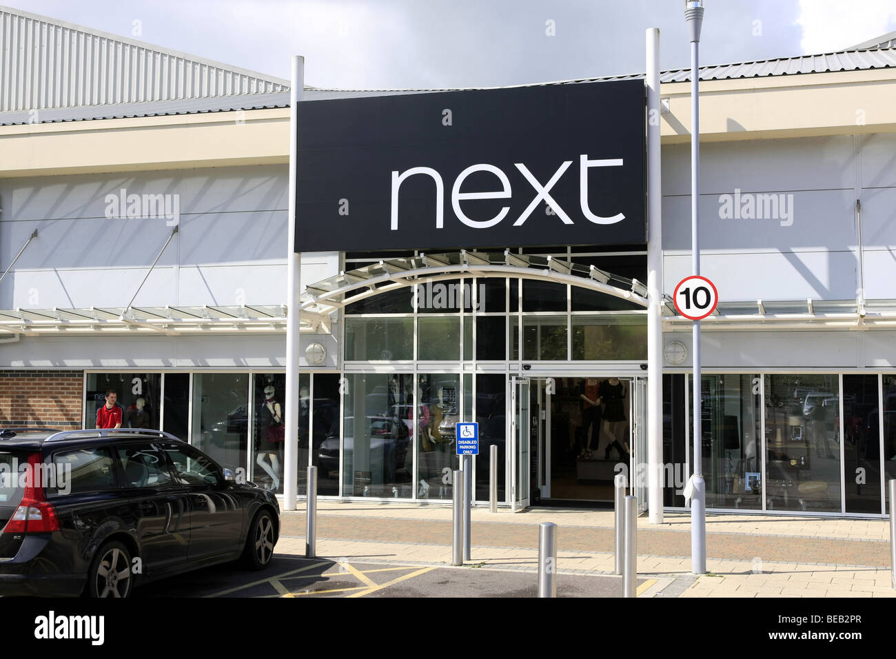 Next fashion wear Store and overhead sign Stock Photo - Alamy