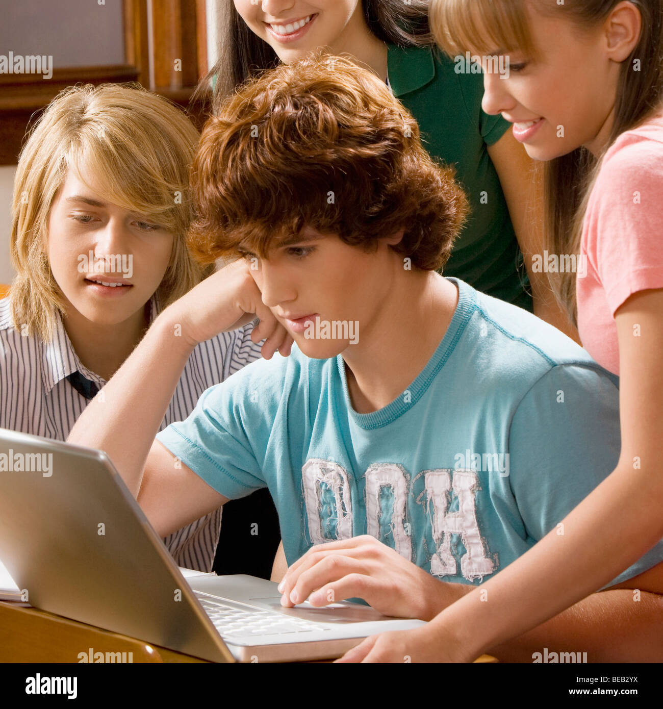 Students using a laptop in the classroom Stock Photo - Alamy