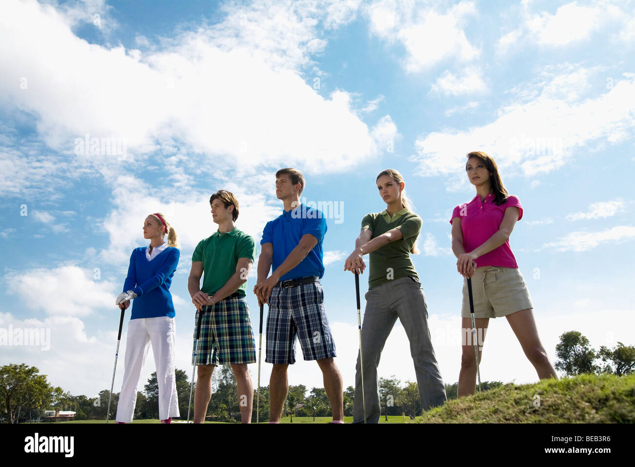 Five friends standing in a golf course, Biltmore Golf Course, Coral ...