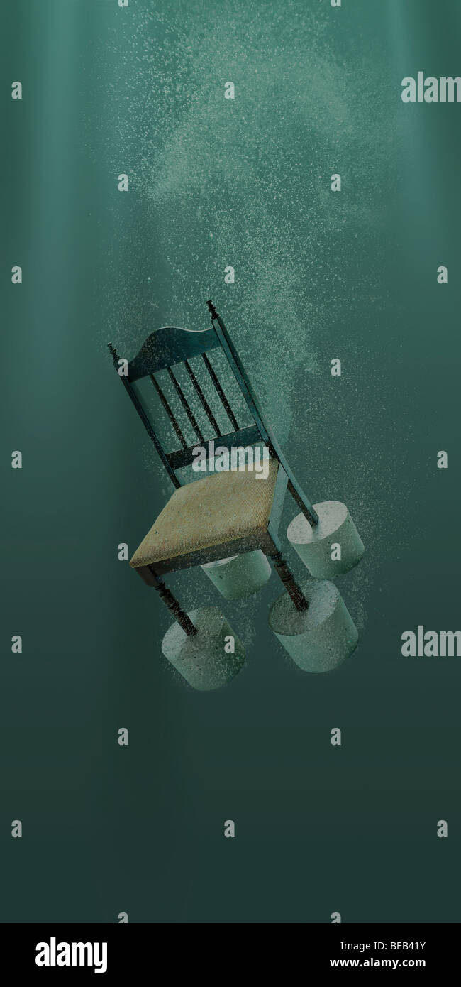 Chair sinking in water Stock Photo - Alamy
