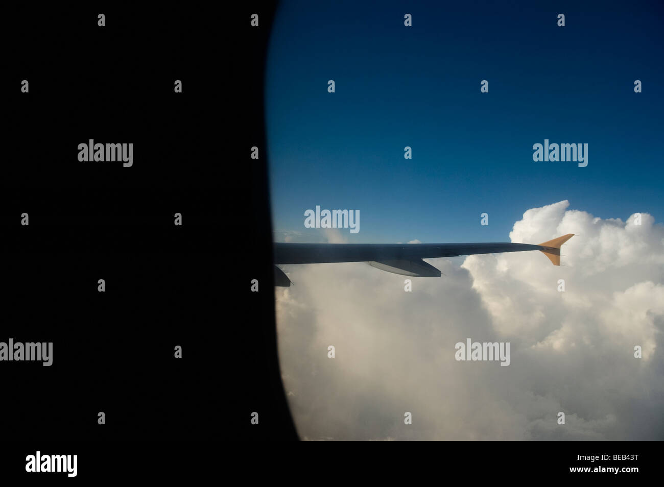 Airplane in flight in the sky Stock Photo - Alamy