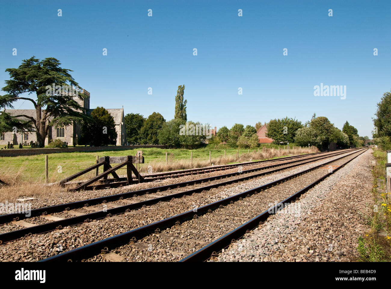 Church and railway line Stock Photo - Alamy