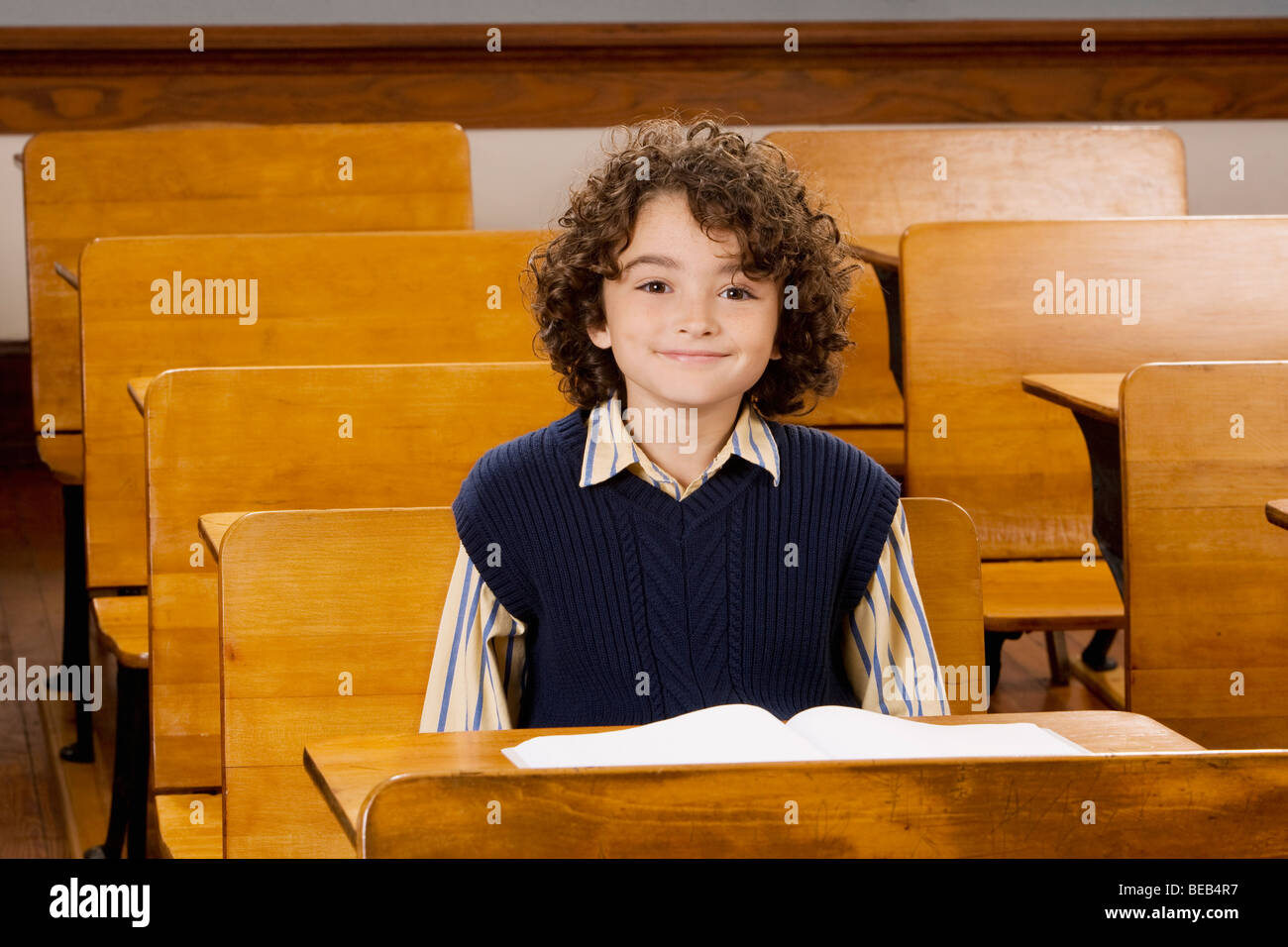 Front view caucasian schoolboy studying hi-res stock photography and ...