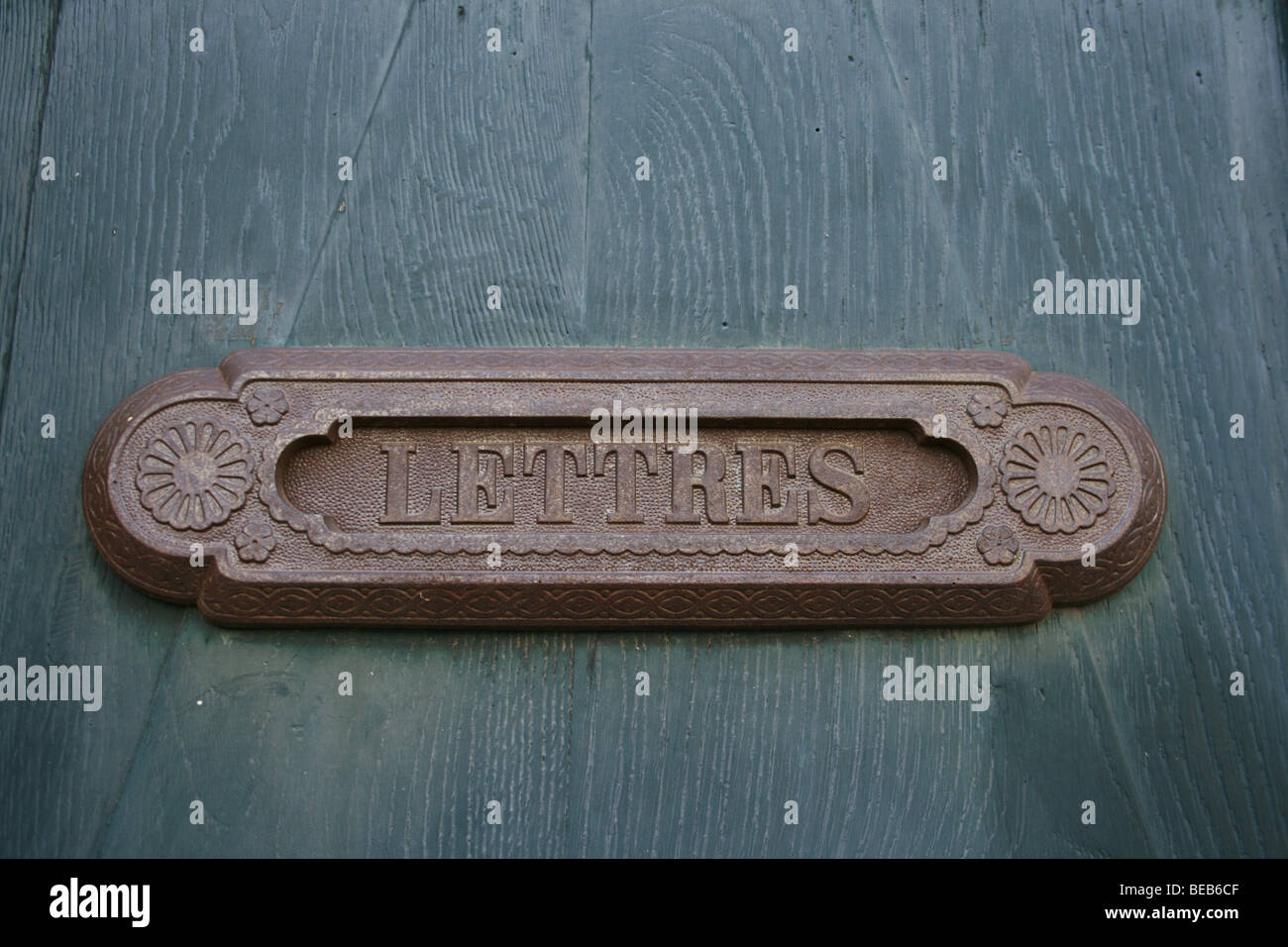 Ornate French letter box Stock Photo - Alamy