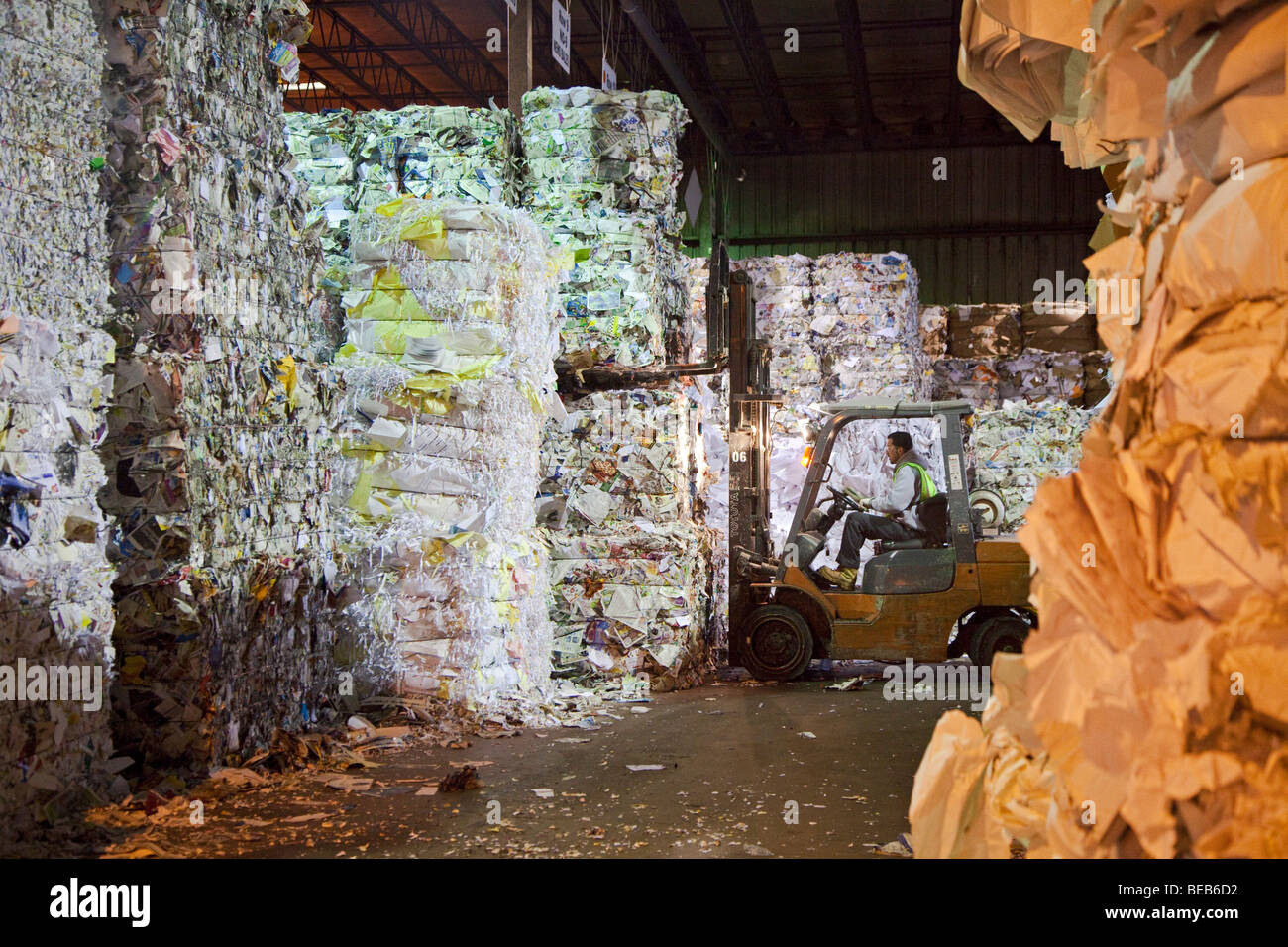Roseville, Michigan - A fork lift moves paper baled for recycling at ...