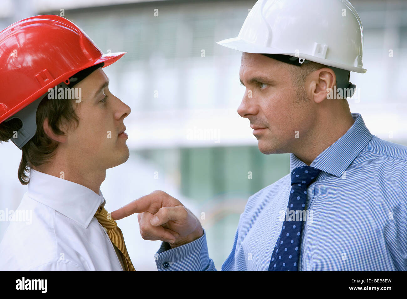 Construction managers arguing on site Stock Photo - Alamy