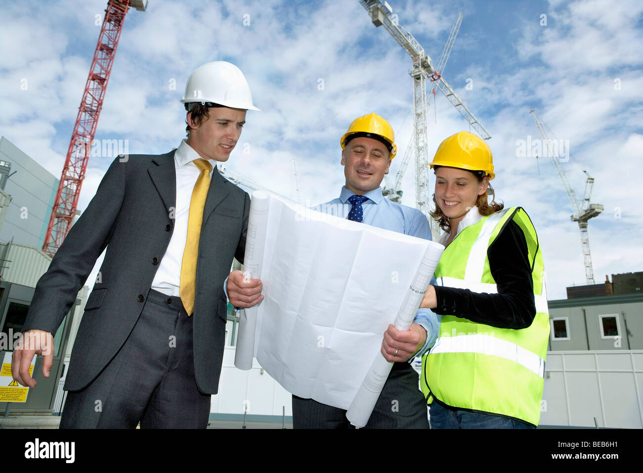 Executive managers on a building site Stock Photo - Alamy
