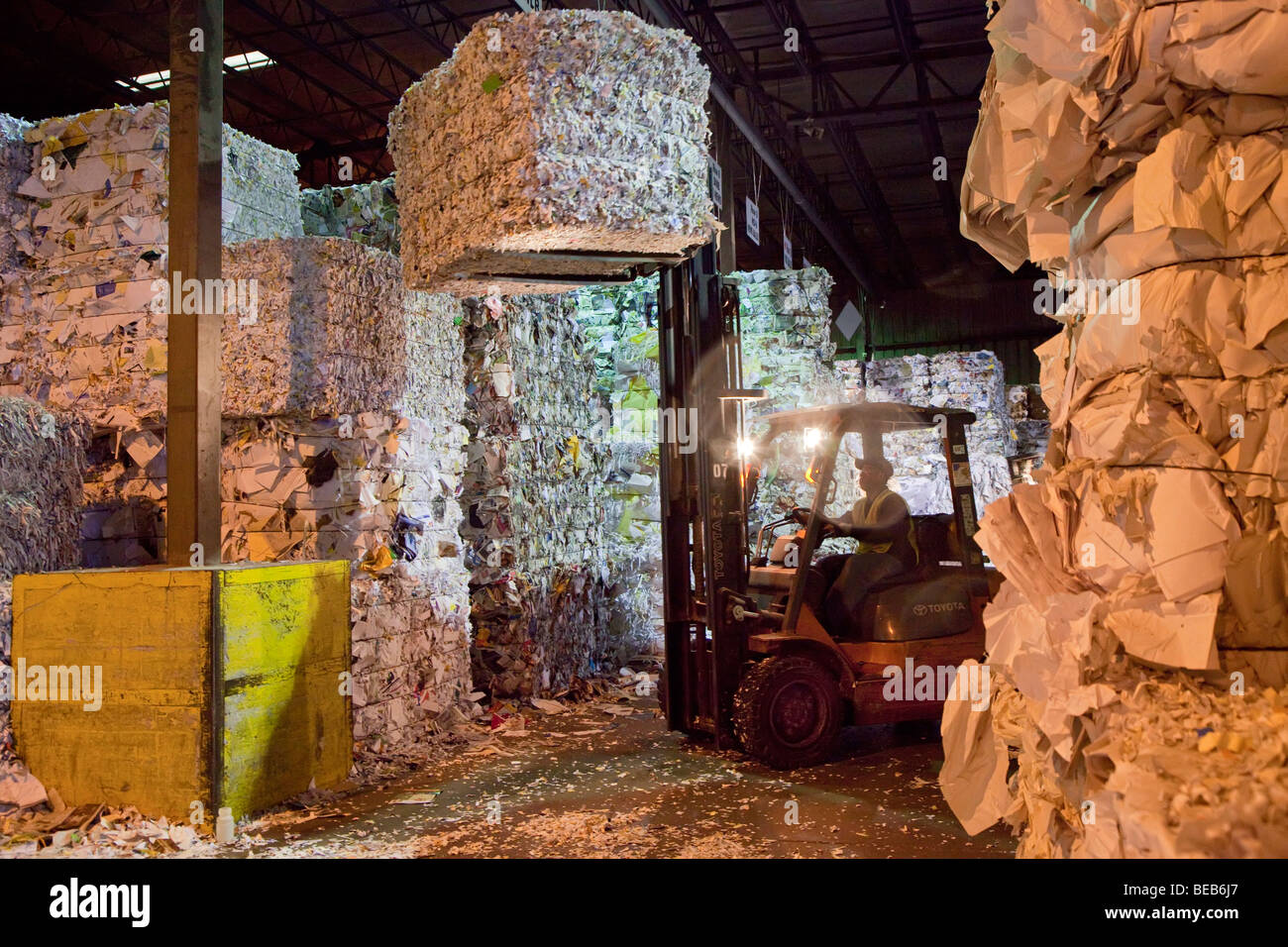 Roseville, Michigan - A fork lift moves paper baled for recycling at ...