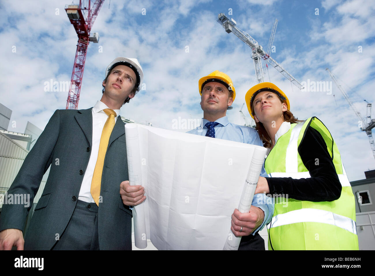 Executive managers on a building site Stock Photo - Alamy