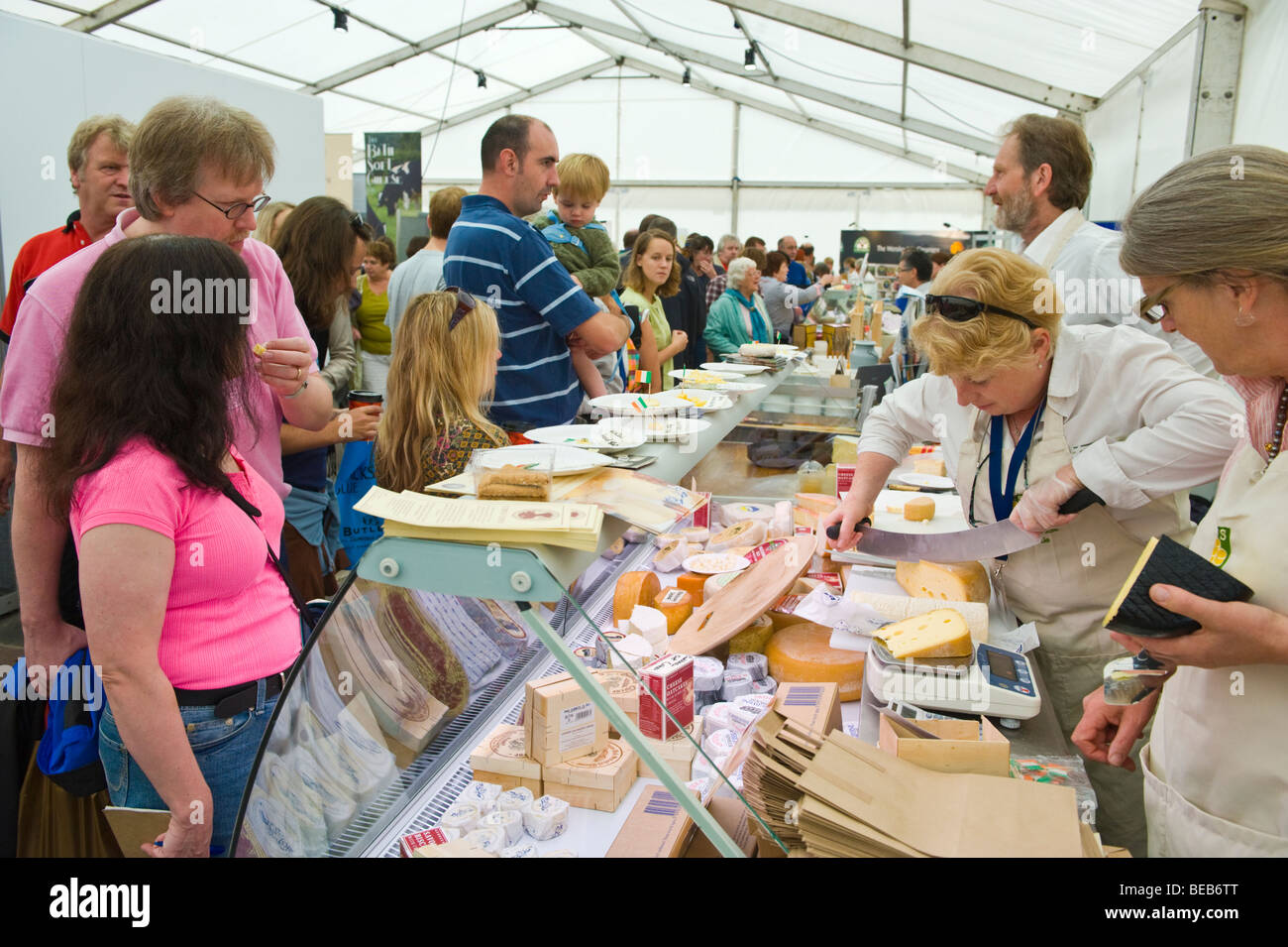 Visitors sampling cheese at The Great British Cheese Festival Cardiff ...
