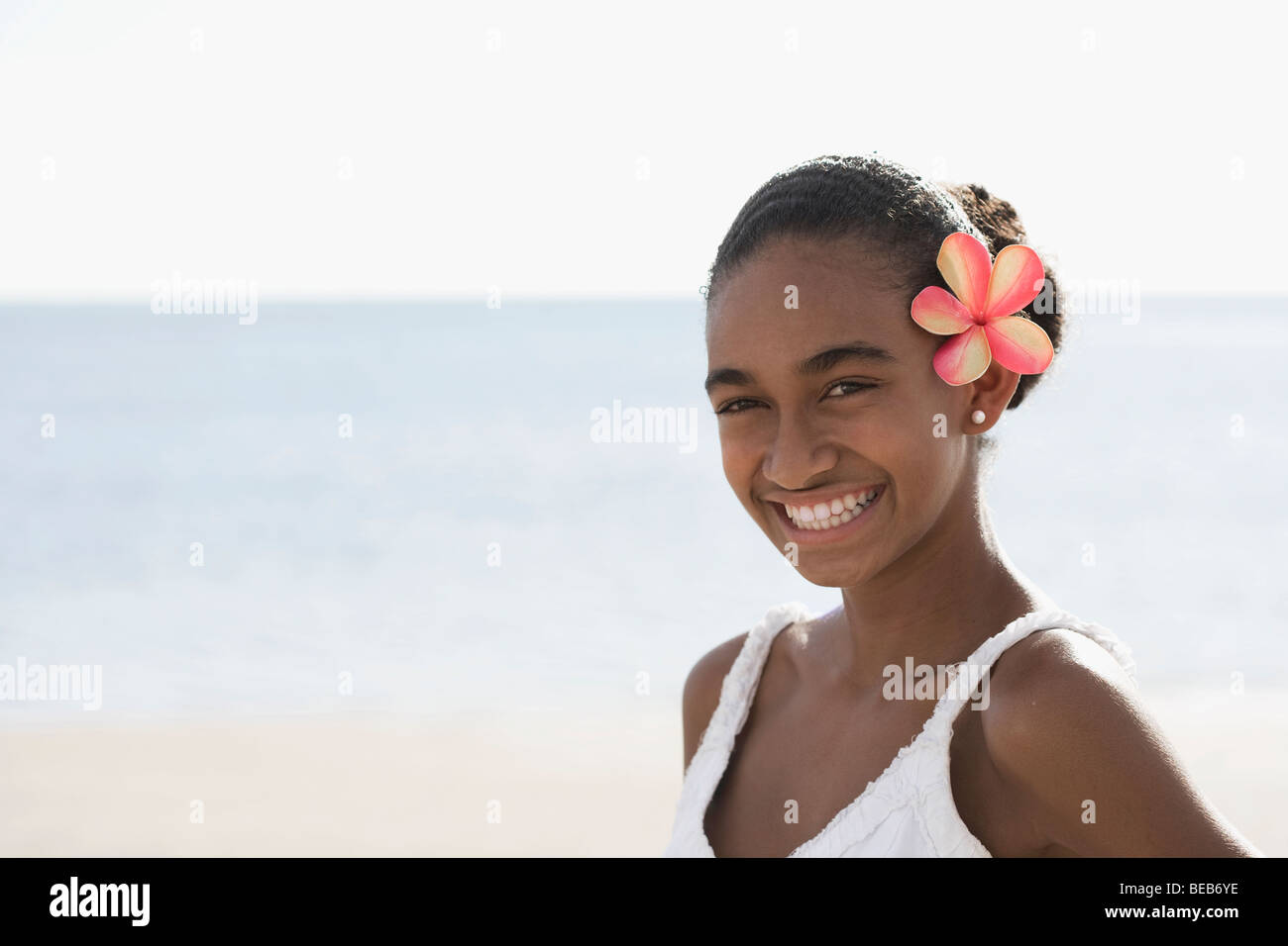 Portrait of a woman smiling on the beach Stock Photo - Alamy