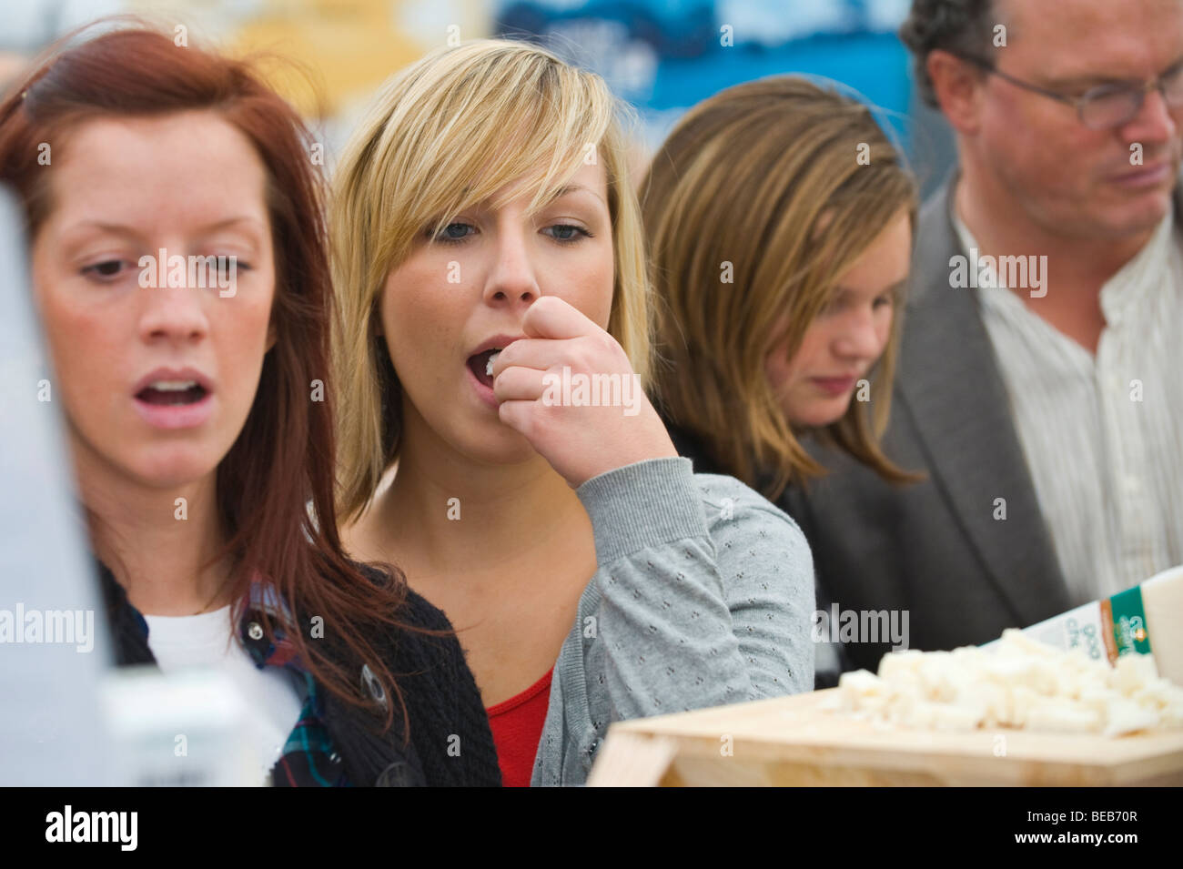 Young women sampling cheese at The Great British Cheese Festival ...