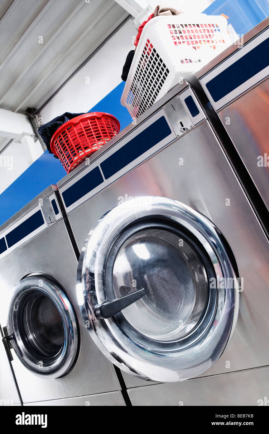 Photography of a washing machine in a launderette hi-res stock ...