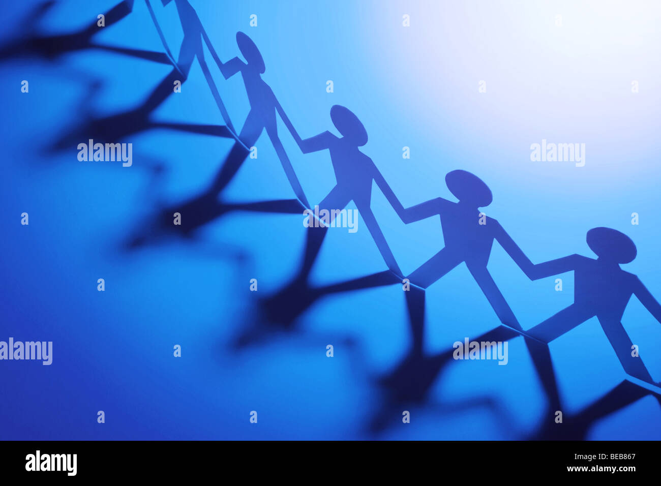 Paper Chain Dolls Stock Photo - Alamy