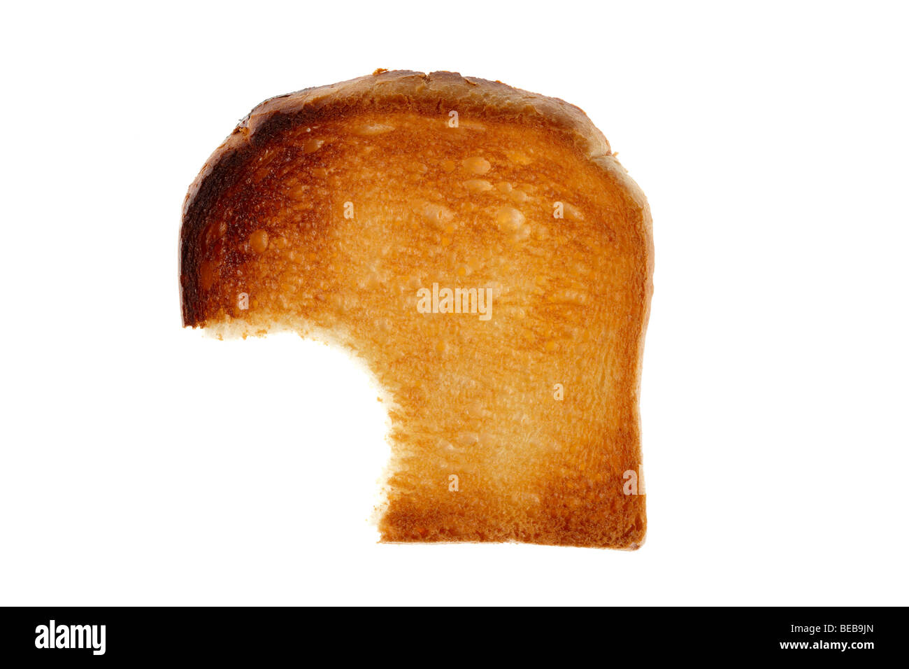 Toast with a bite missing Stock Photo - Alamy
