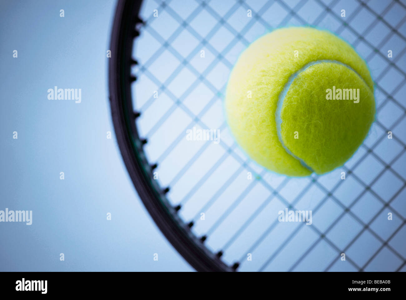 Close-up of a tennis ball and a tennis racket Stock Photo - Alamy