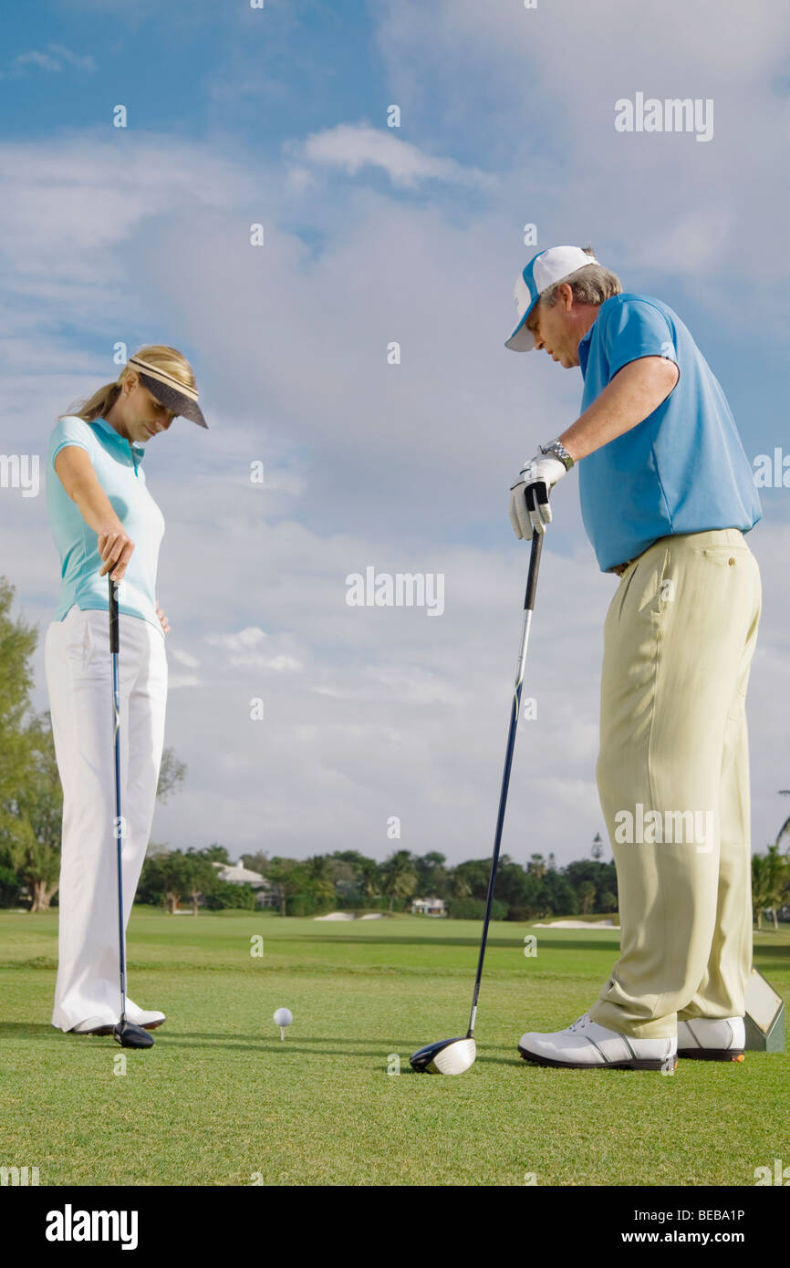 Two golfer standing in a golf course, Biltmore Golf Course, Coral ...