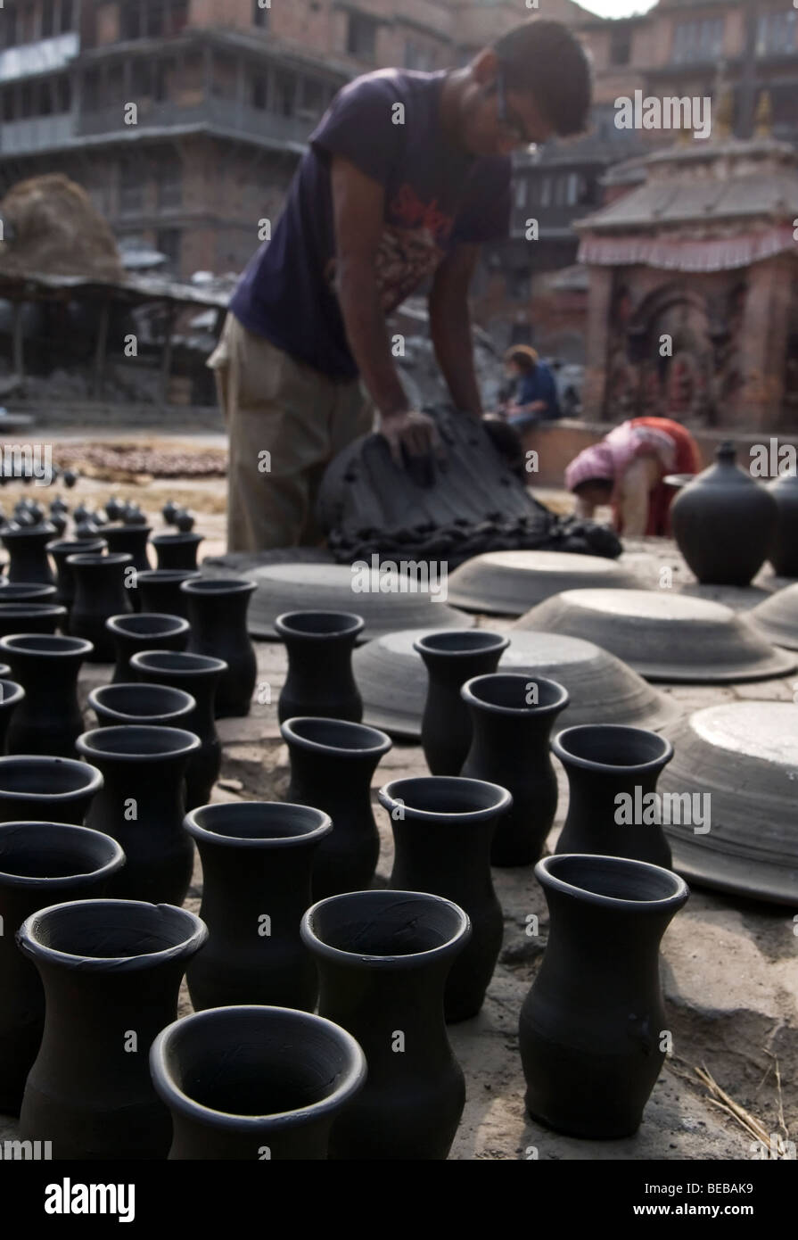 Local potters working in Pottery Square, Bhaktapur, Nepal Stock Photo ...