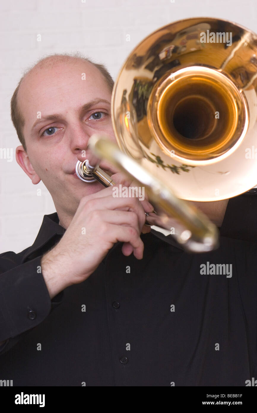 Playing trumpet home hi-res stock photography and images - Alamy