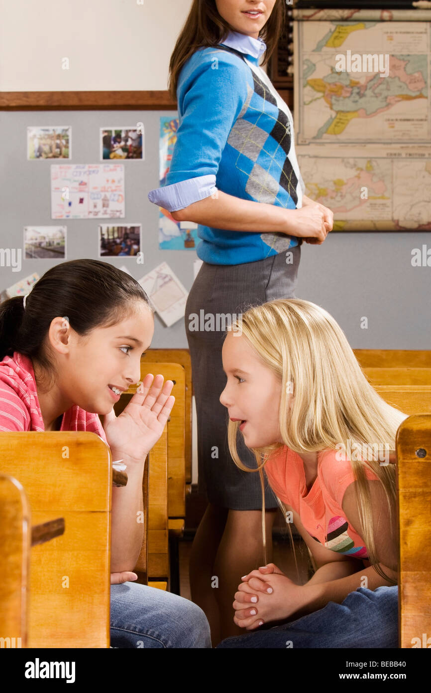 Classroom students talking whisper hi-res stock photography and images ...