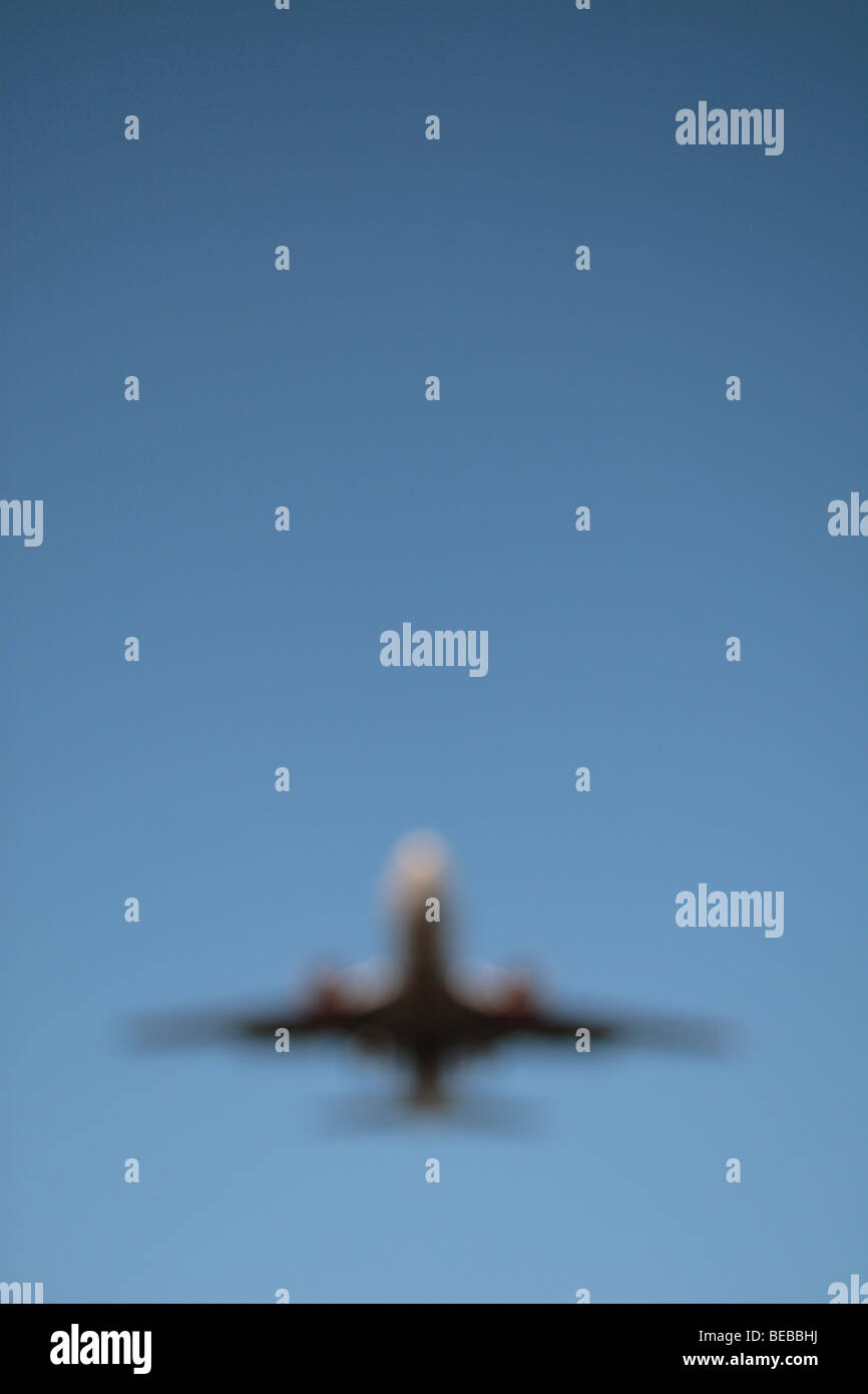 An out of focus image of a plane coming in to land on the South Runway ...