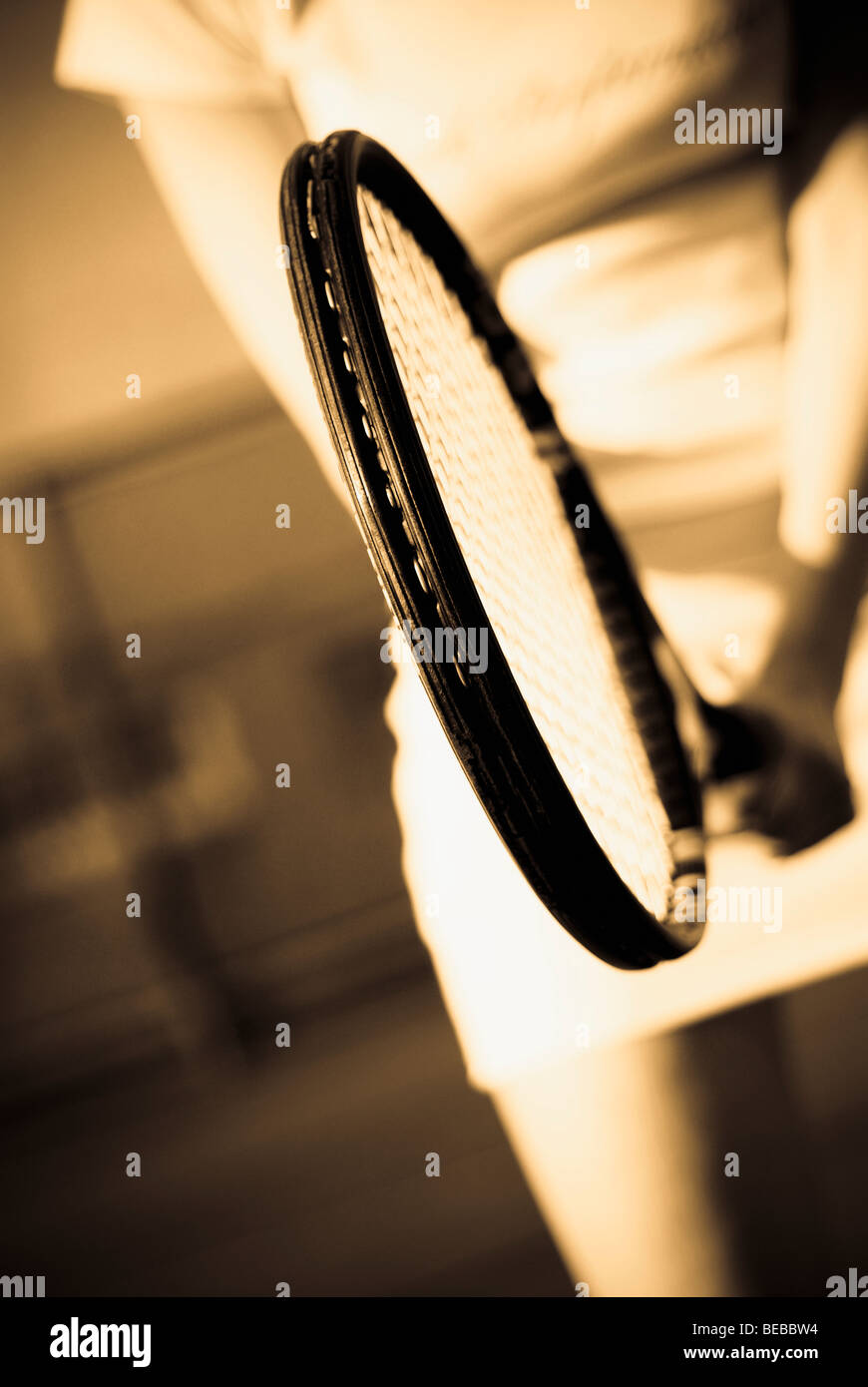Woman's hand holding a tennis racket Stock Photo - Alamy