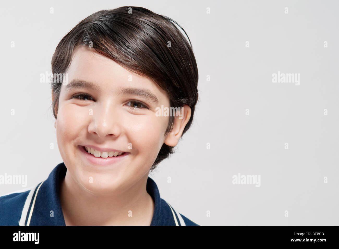 Portrait of a boy smiling Stock Photo - Alamy