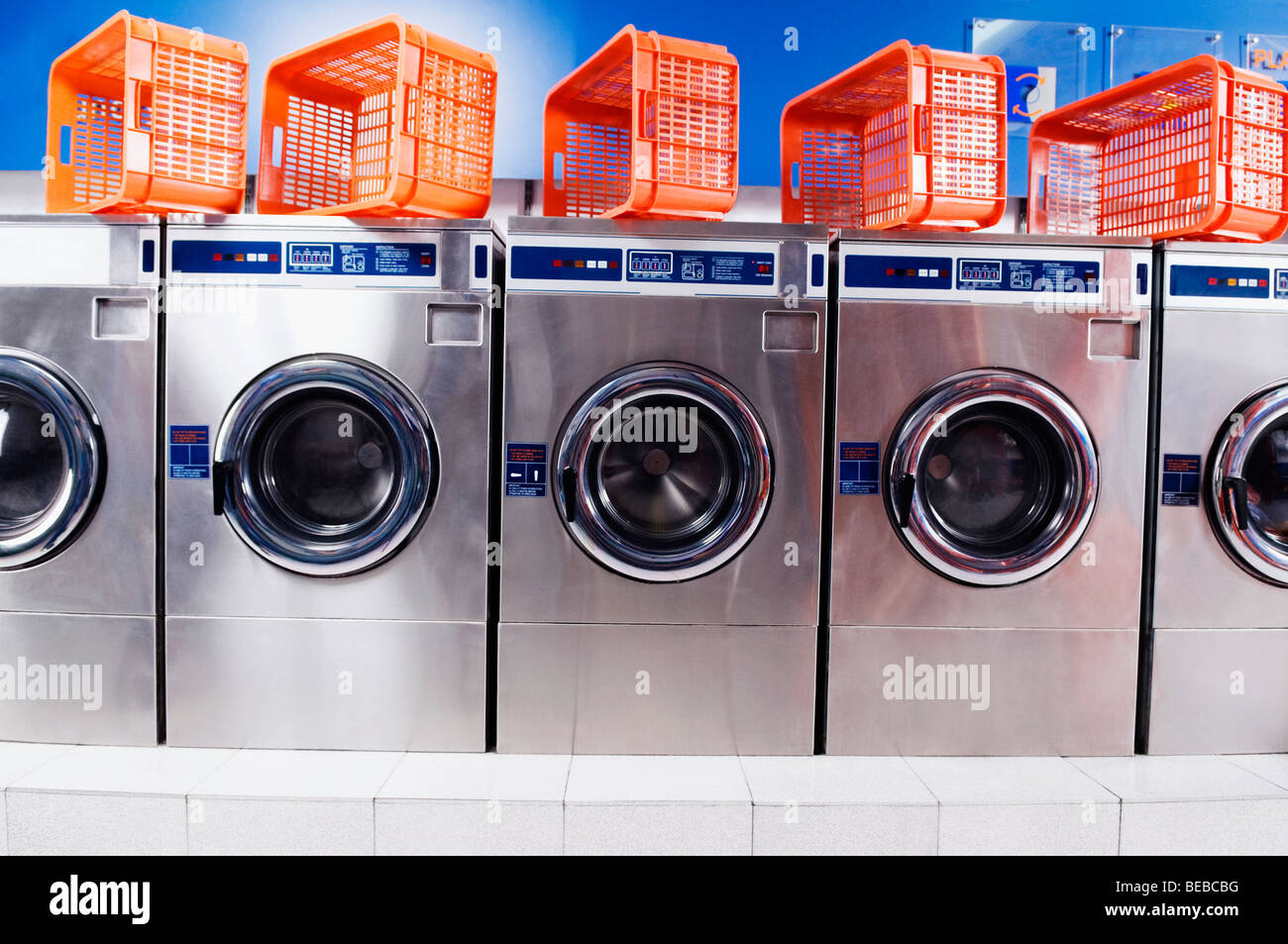 Photography of a washing machine in a launderette hi-res stock ...