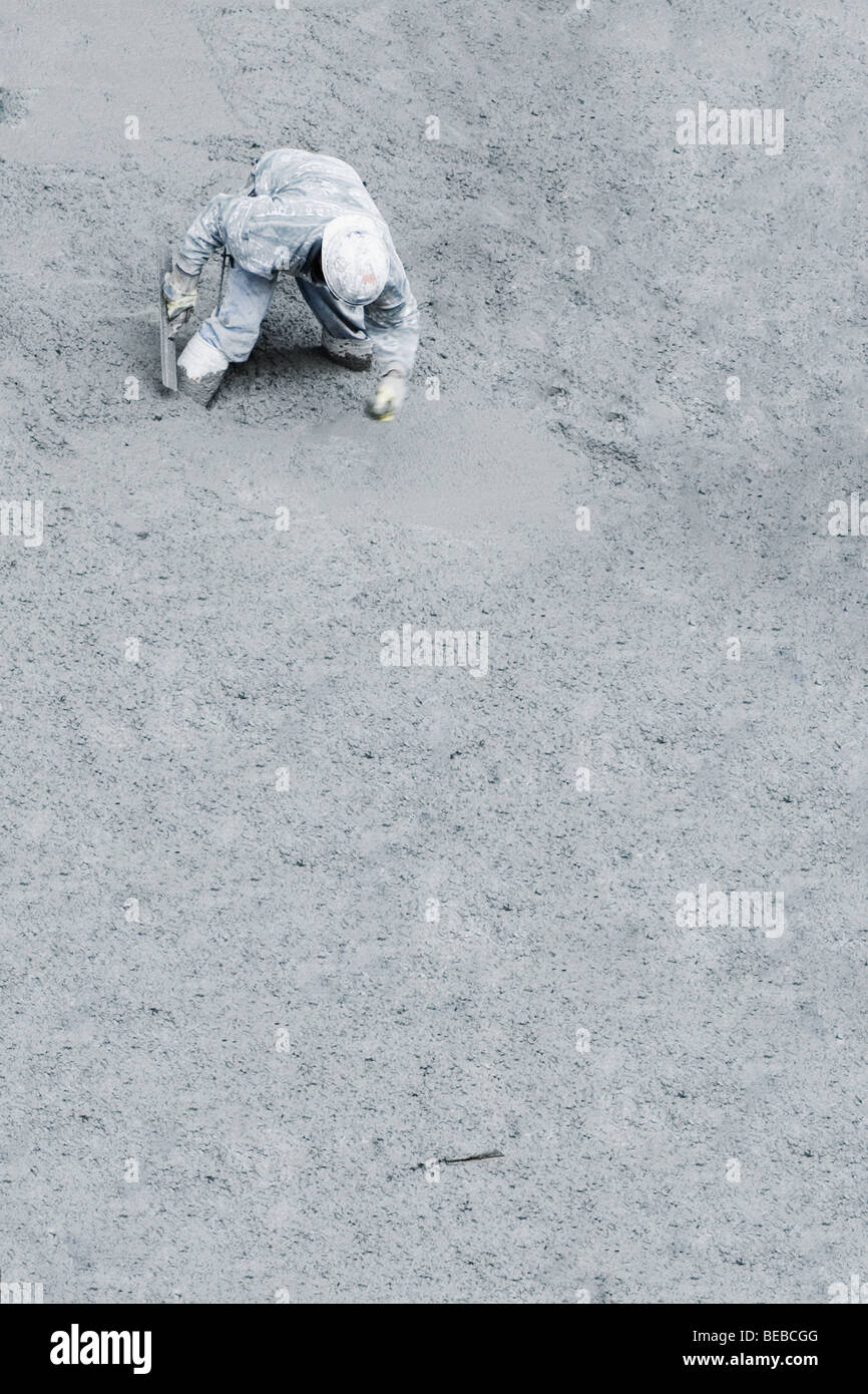 High angle view of a construction worker working at a construction site ...