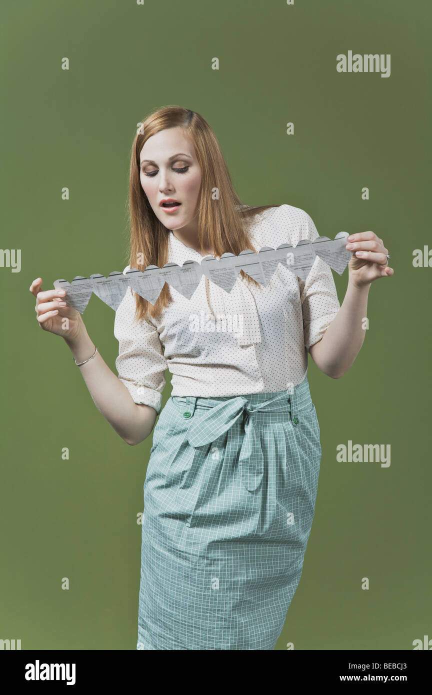 Woman holding a heart shaped paper chain Stock Photo - Alamy