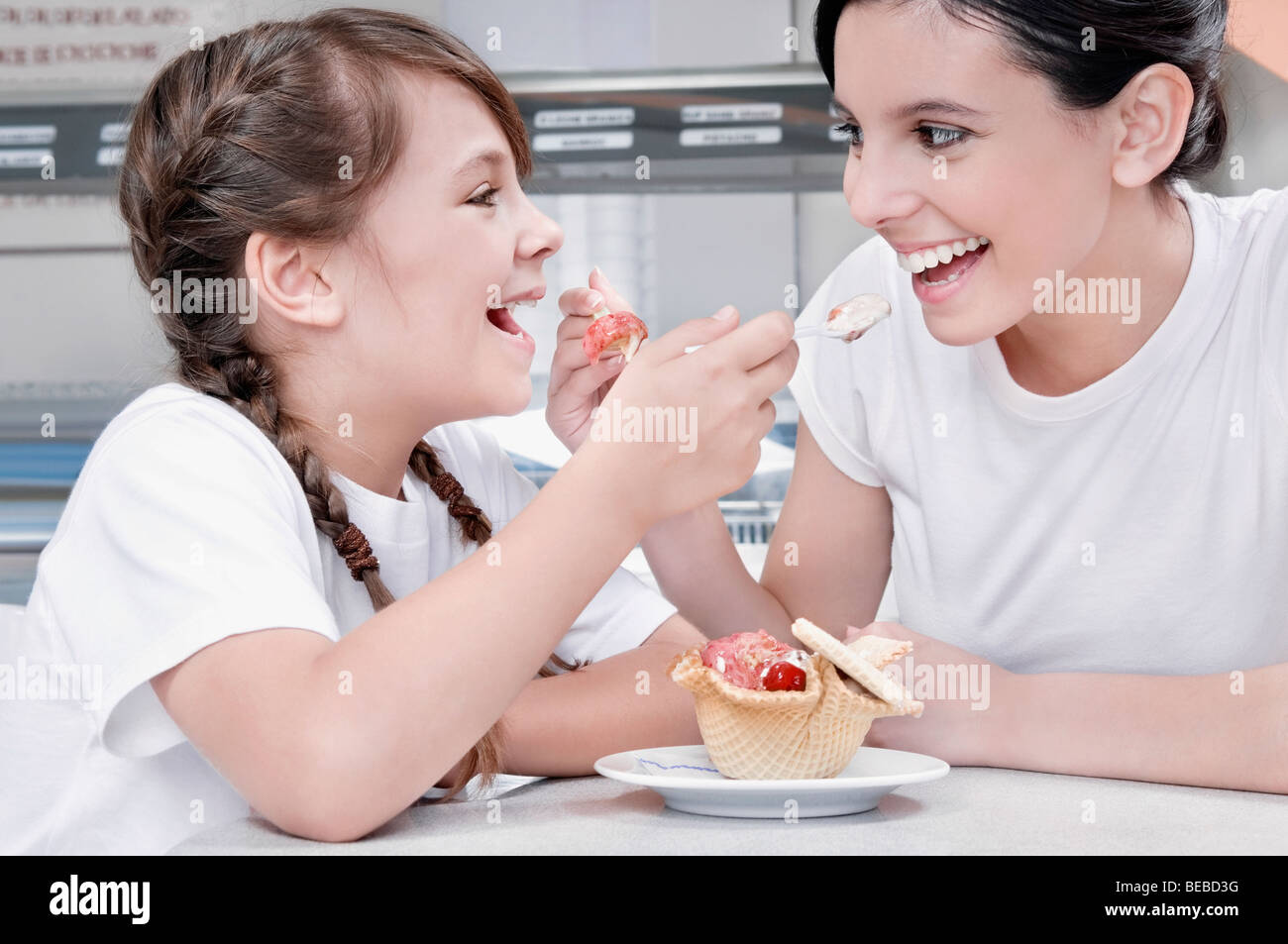Tween eating ice cream hi-res stock photography and images - Alamy
