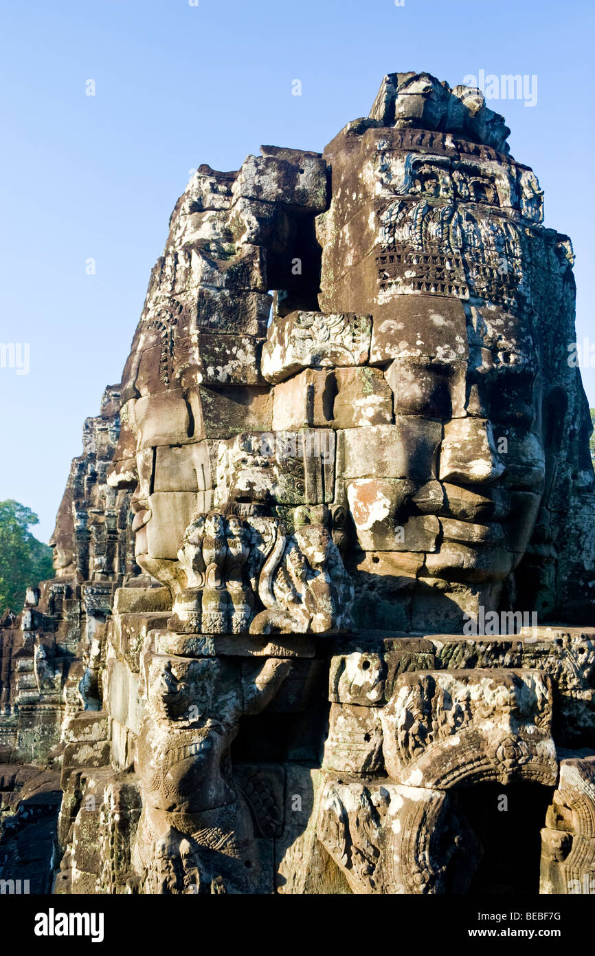 Face Tower showing three huge carved faces, The Bayon, Temples of ...
