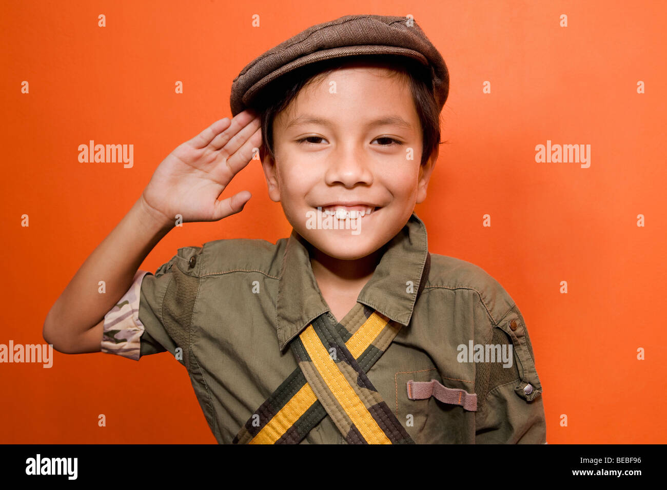 Close-up of a boy saluting Stock Photo - Alamy