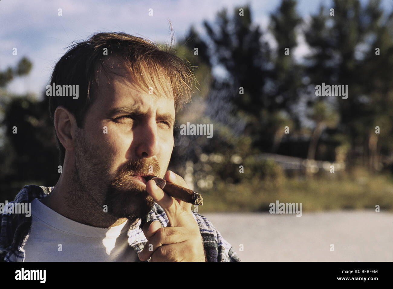 Smoking cigar man hi-res stock photography and images - Alamy