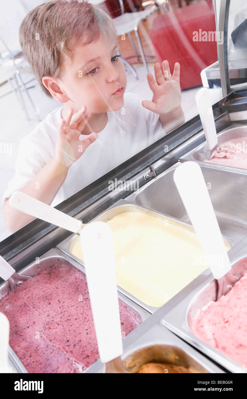 Boy choosing ice cream in an ice cream parlor Stock Photo - Alamy