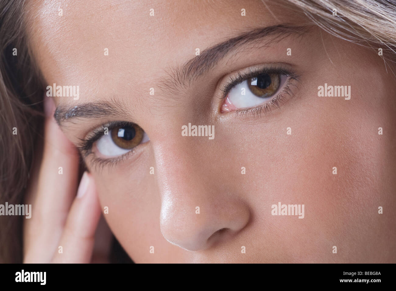 Portrait of a girl thinking Stock Photo - Alamy