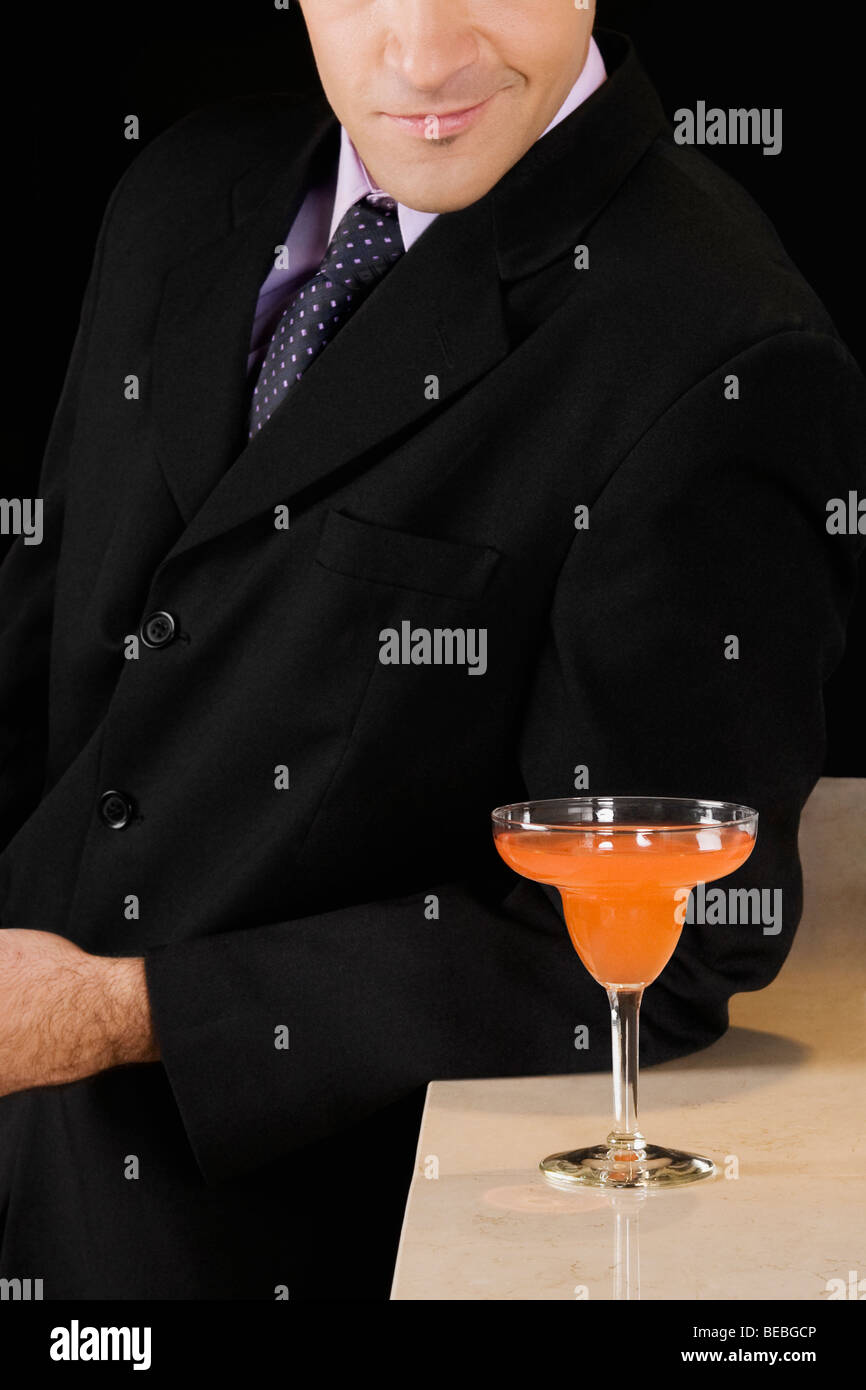 Businessman in a bar Stock Photo - Alamy