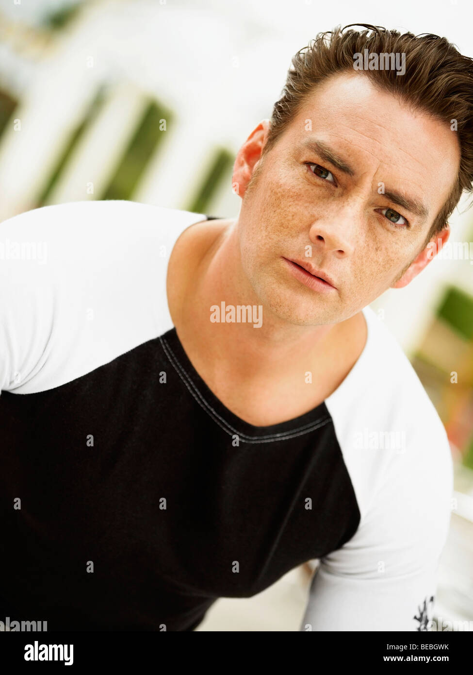 Portrait of a young man looking serious Stock Photo - Alamy