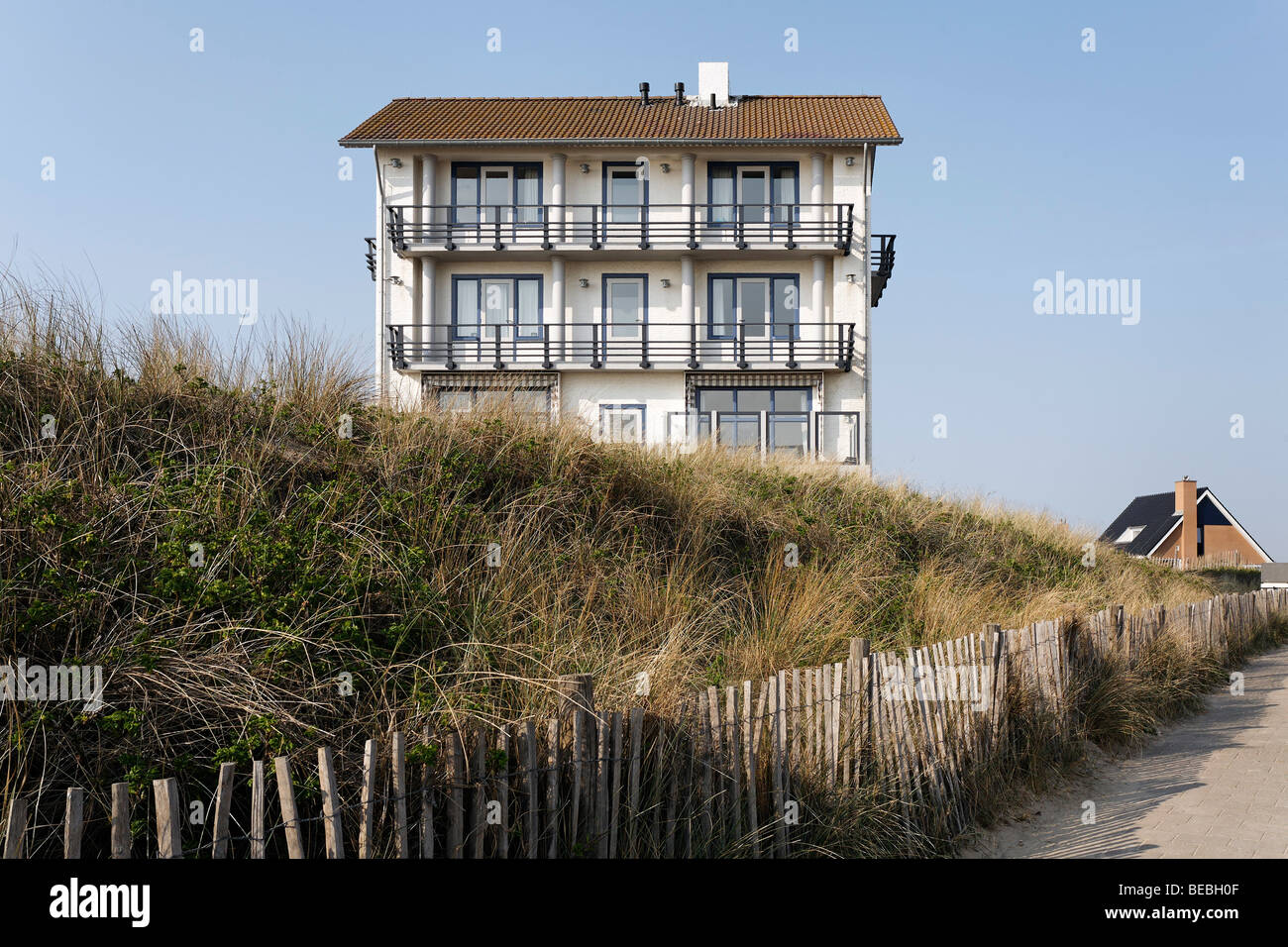 House on the dunes with holiday apartments, typical seaside resort on ...