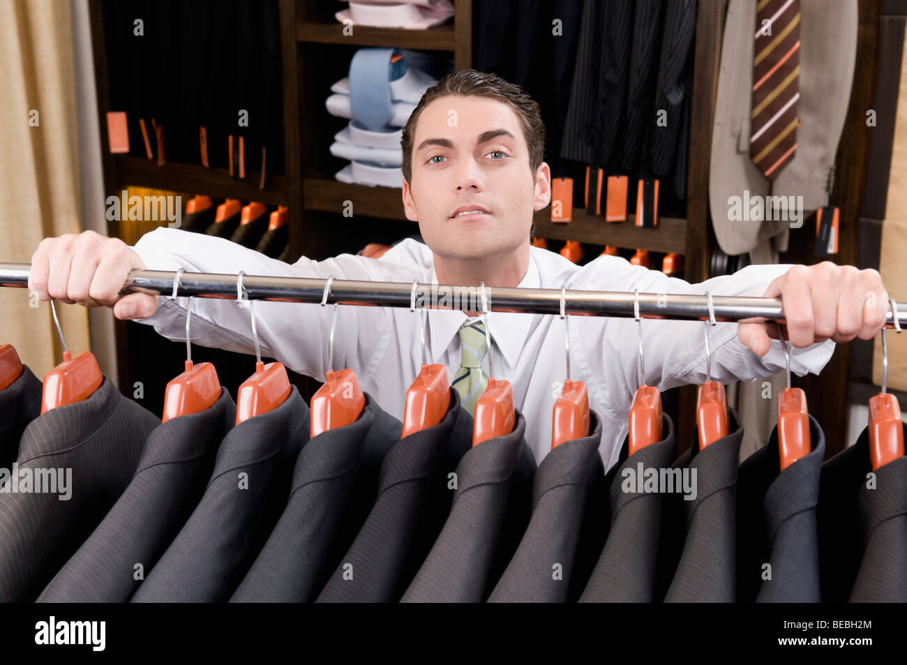 Customer shopping in a clothing store Stock Photo - Alamy