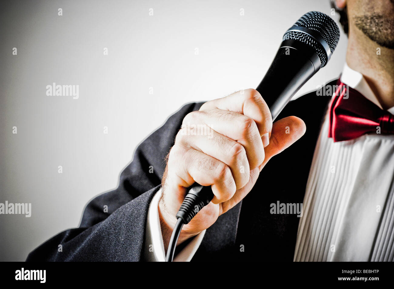 Standing holding singing microphone skill hi-res stock photography and ...