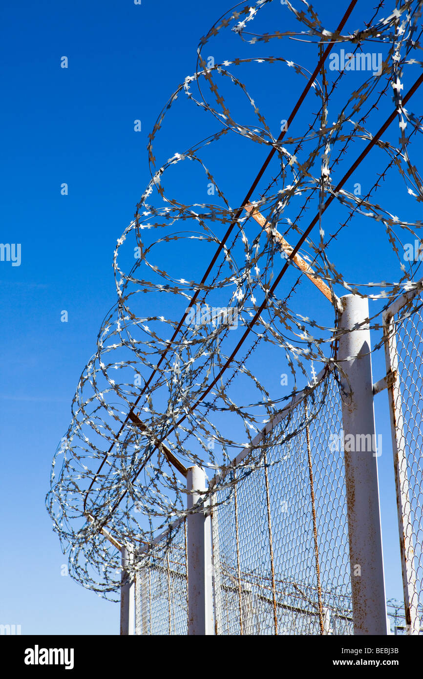 Barbed wire spiral fence hi-res stock photography and images - Alamy
