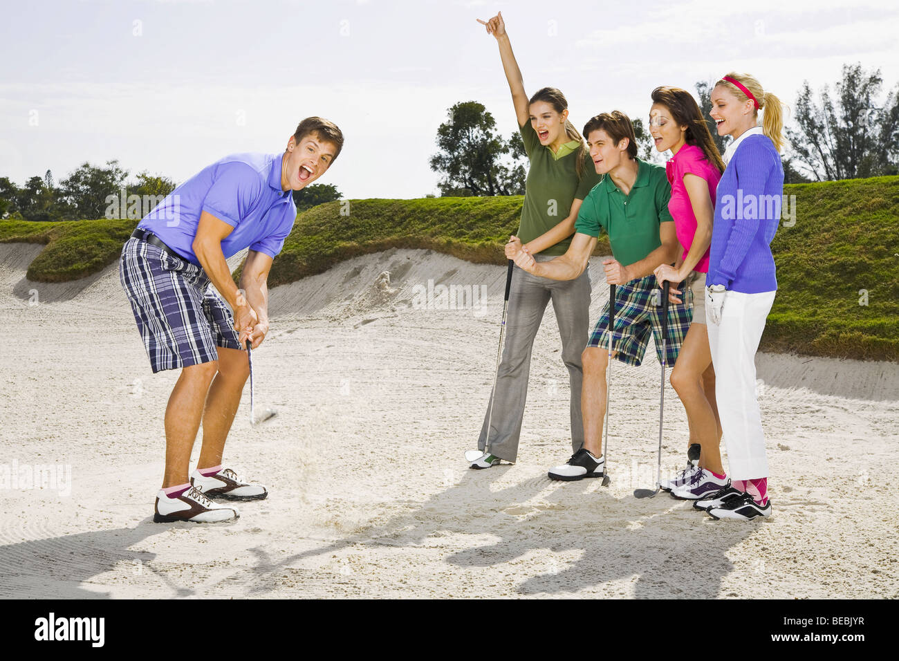 Five friends having fun in a golf course, Biltmore Golf Course, Coral ...