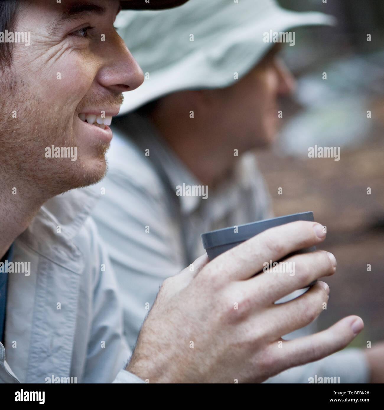 Close-up of hikers drinking tea Stock Photo - Alamy