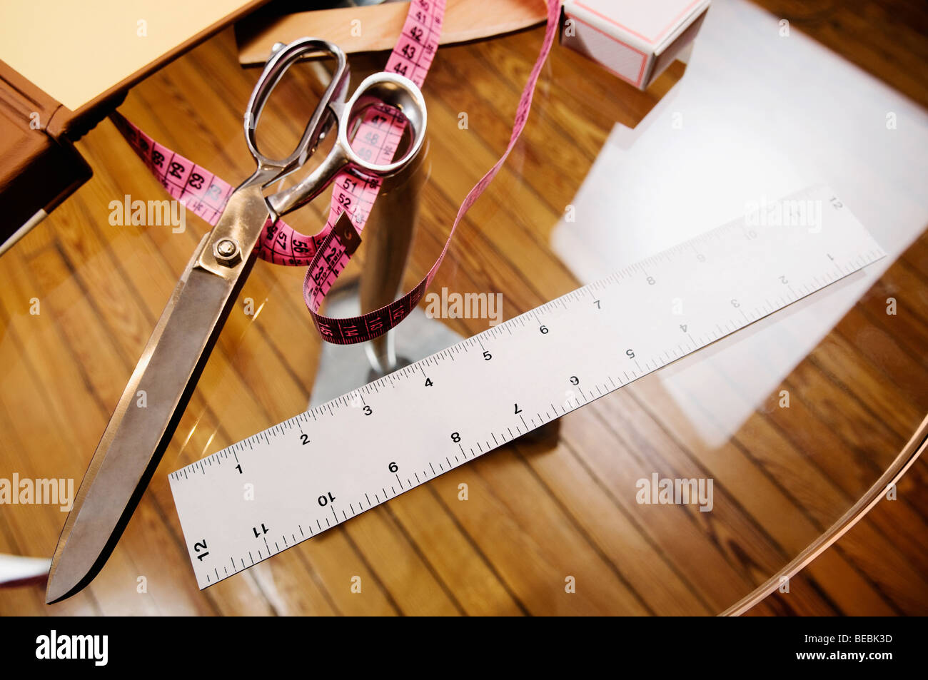Scissors with a tape measure in a clothing design studio Stock Photo ...