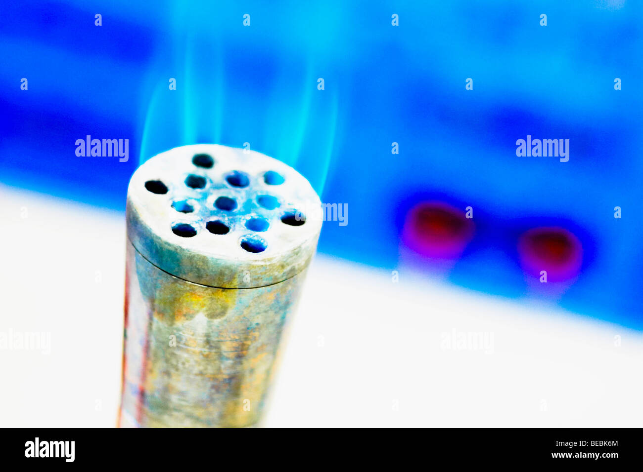Flame emerging from a metallic cylinder Stock Photo - Alamy