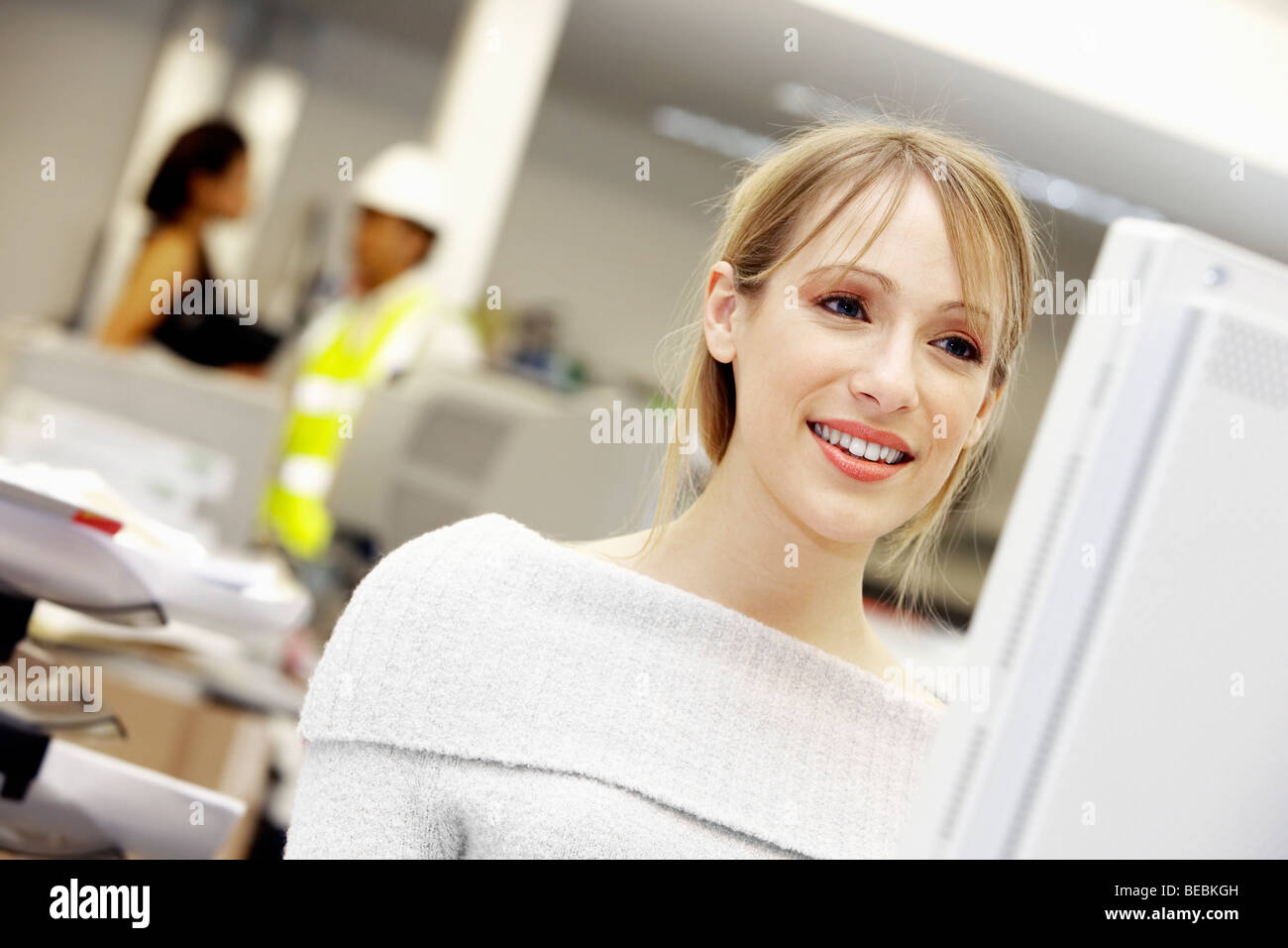 Woman working on computer Stock Photo - Alamy