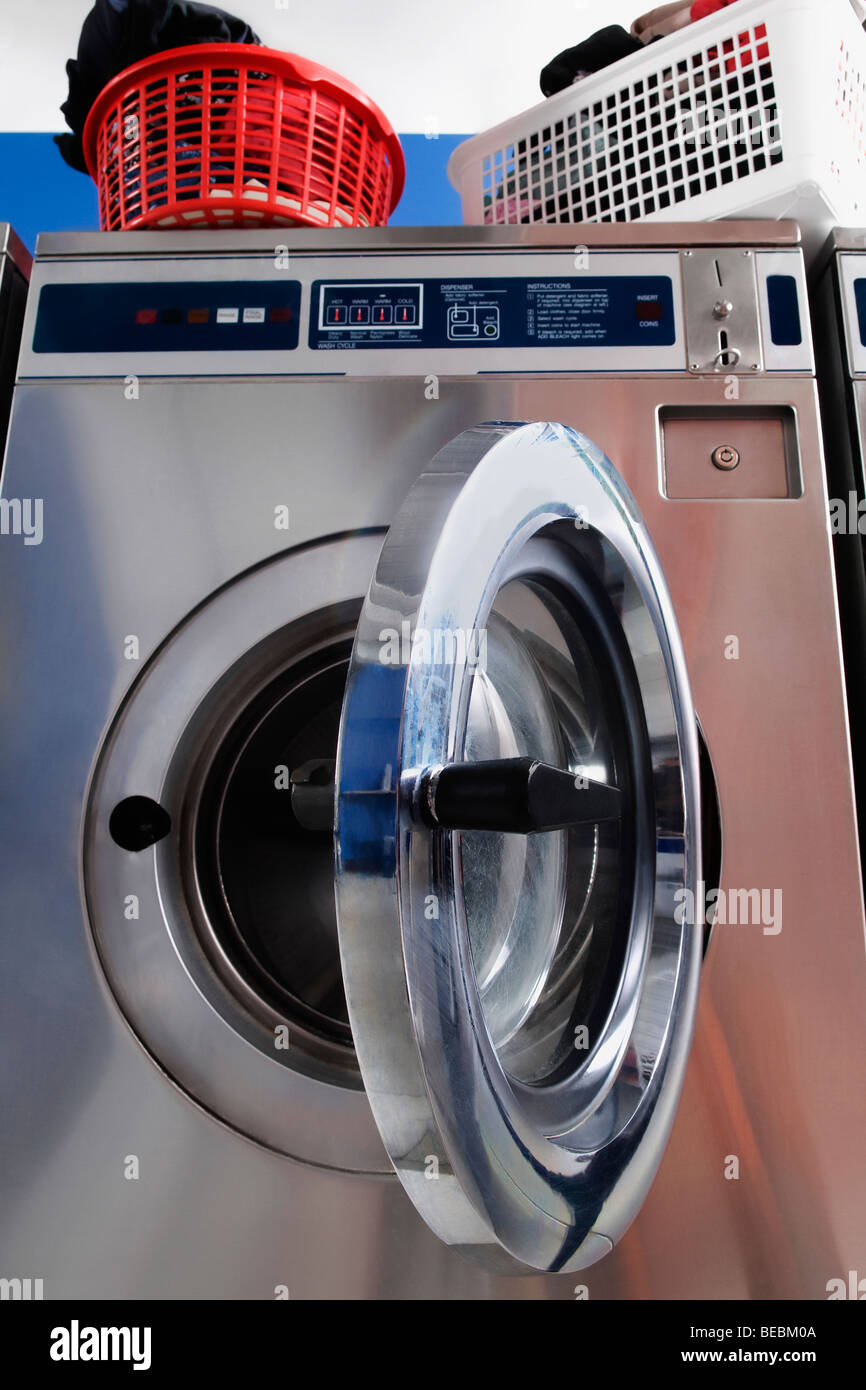Photography of a washing machine in a launderette hi-res stock ...