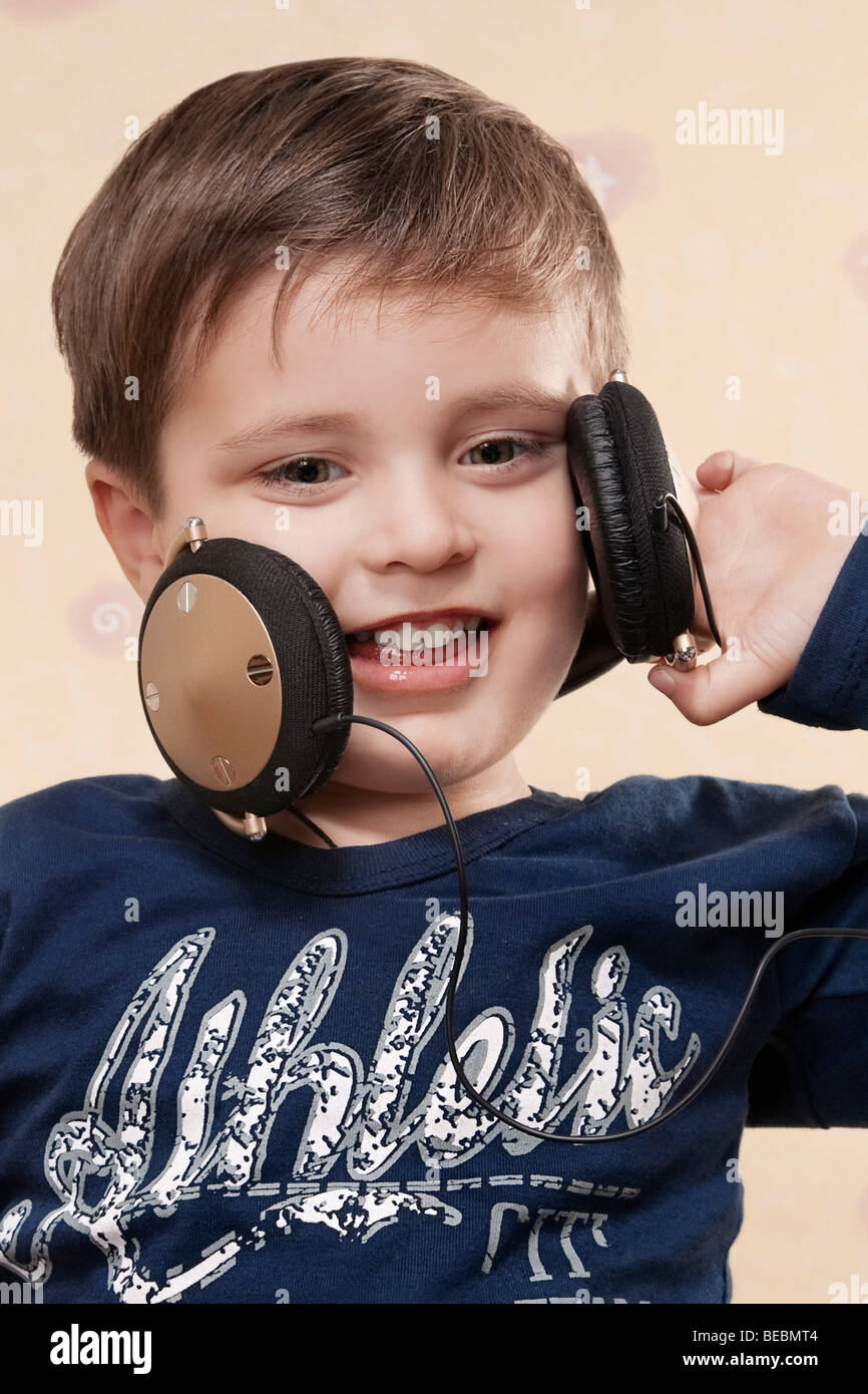 Boy headphones music vertical hi-res stock photography and images - Alamy