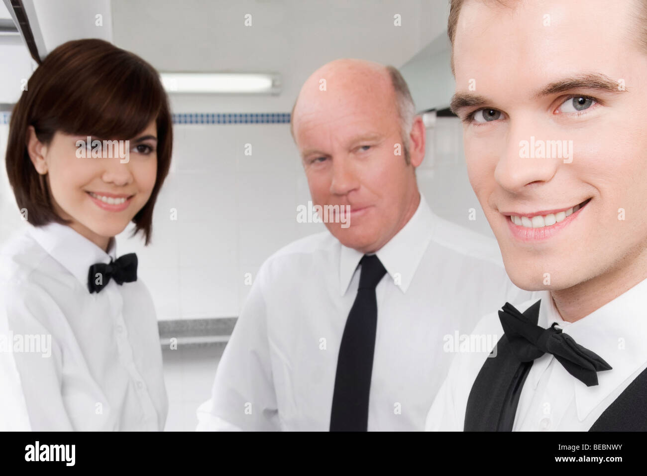 Waiters in a restaurant Stock Photo - Alamy